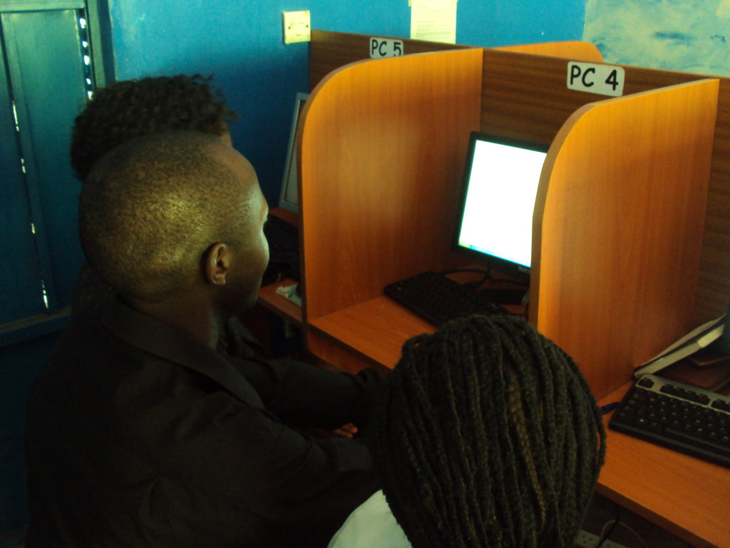 A copier for a youth computer center in Uganda - GlobalGiving